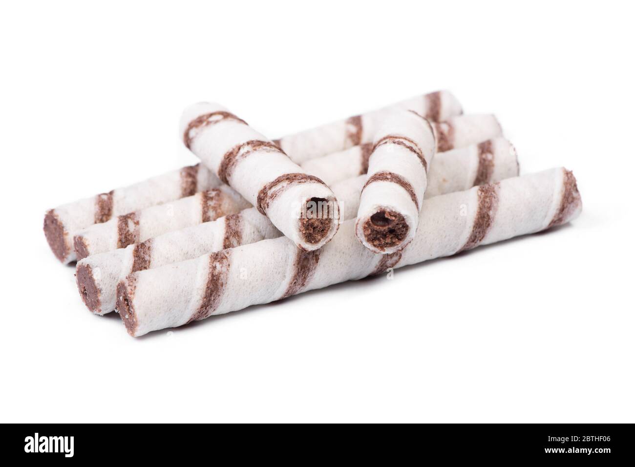 Group of sweet spiral tubes isolated on white background Stock Photo ...