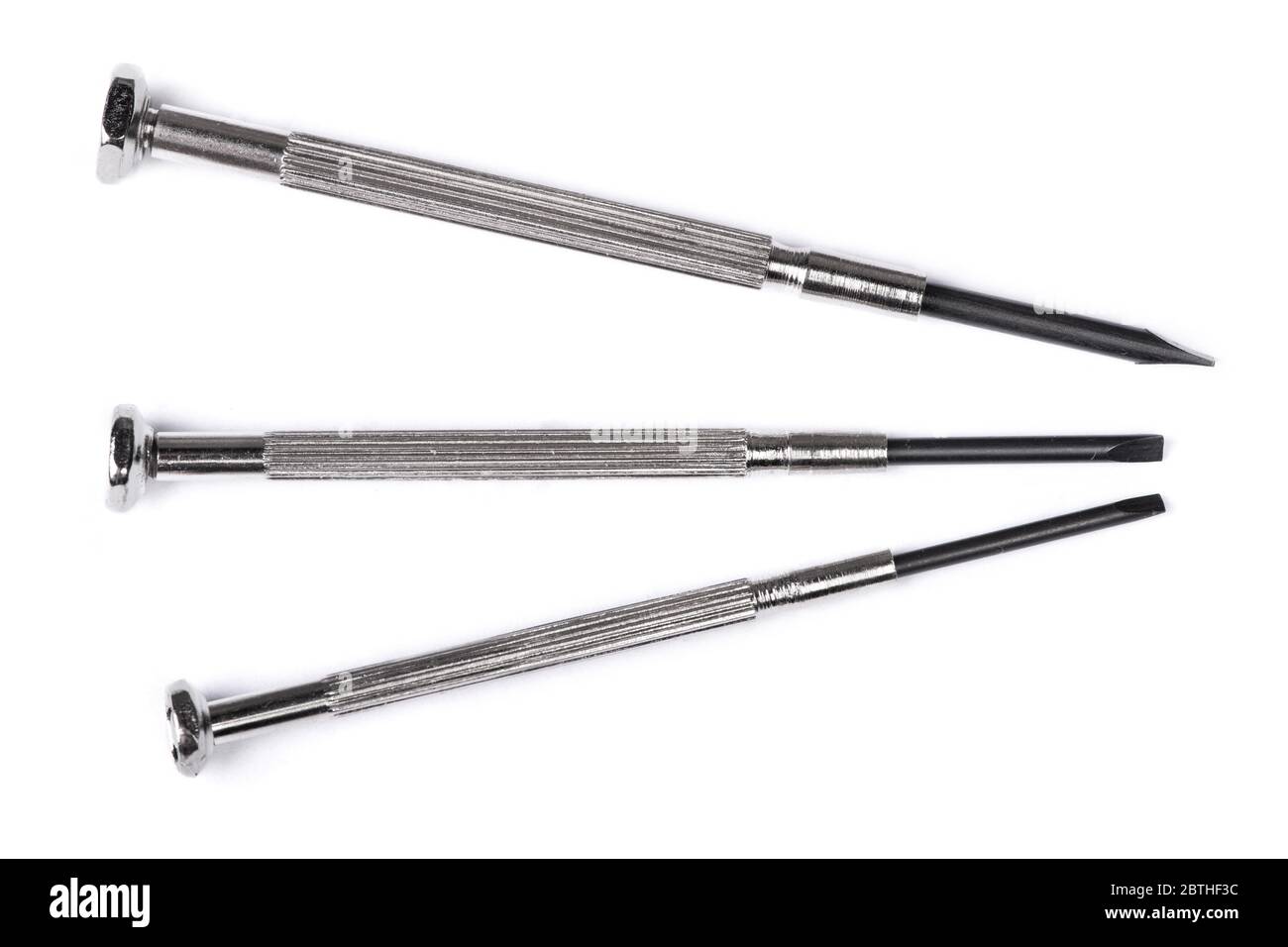 Set of small screwdrivers for small screws isolated on white background ...