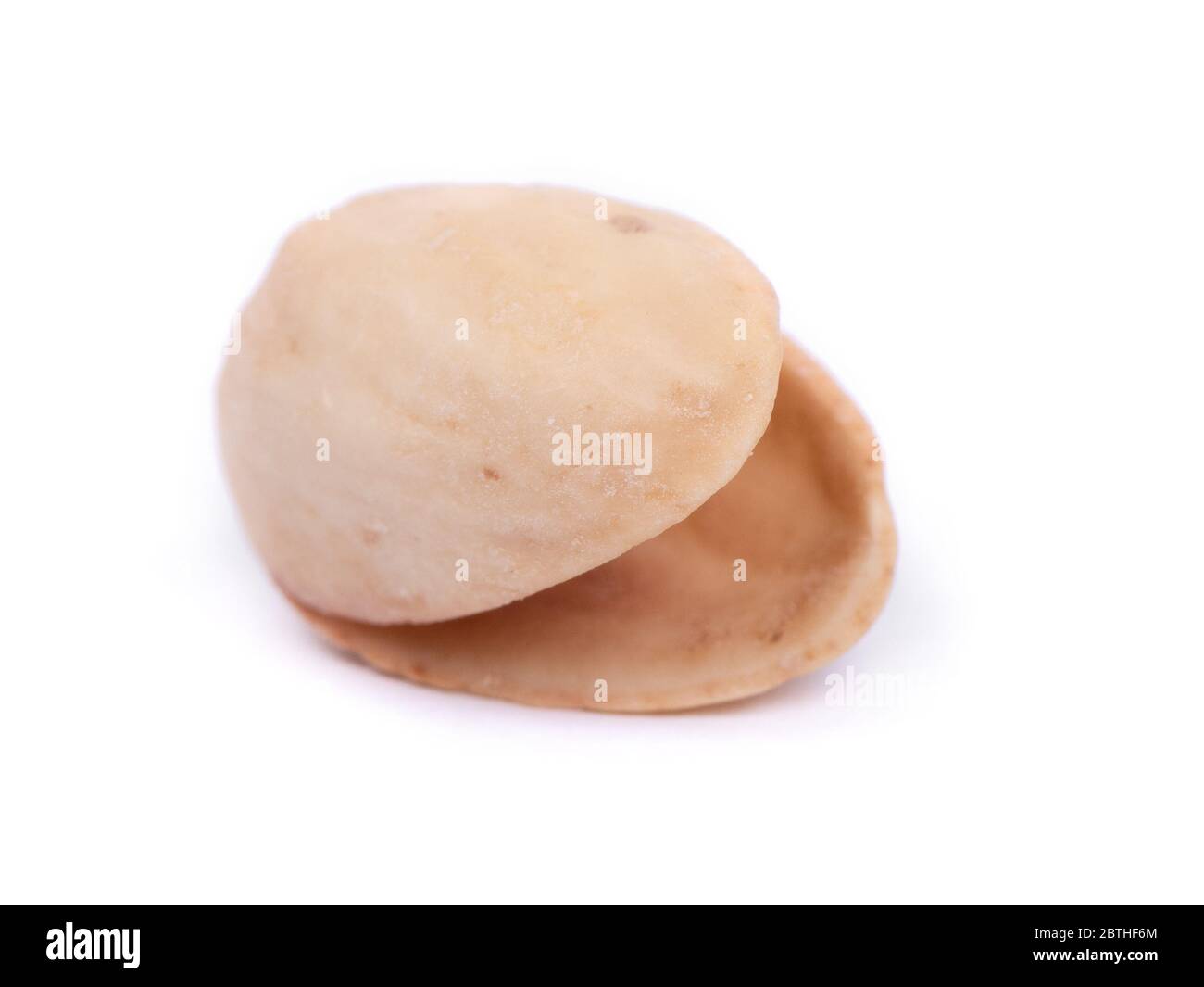 Single empty pistachio shell isolated on white background Stock Photo ...