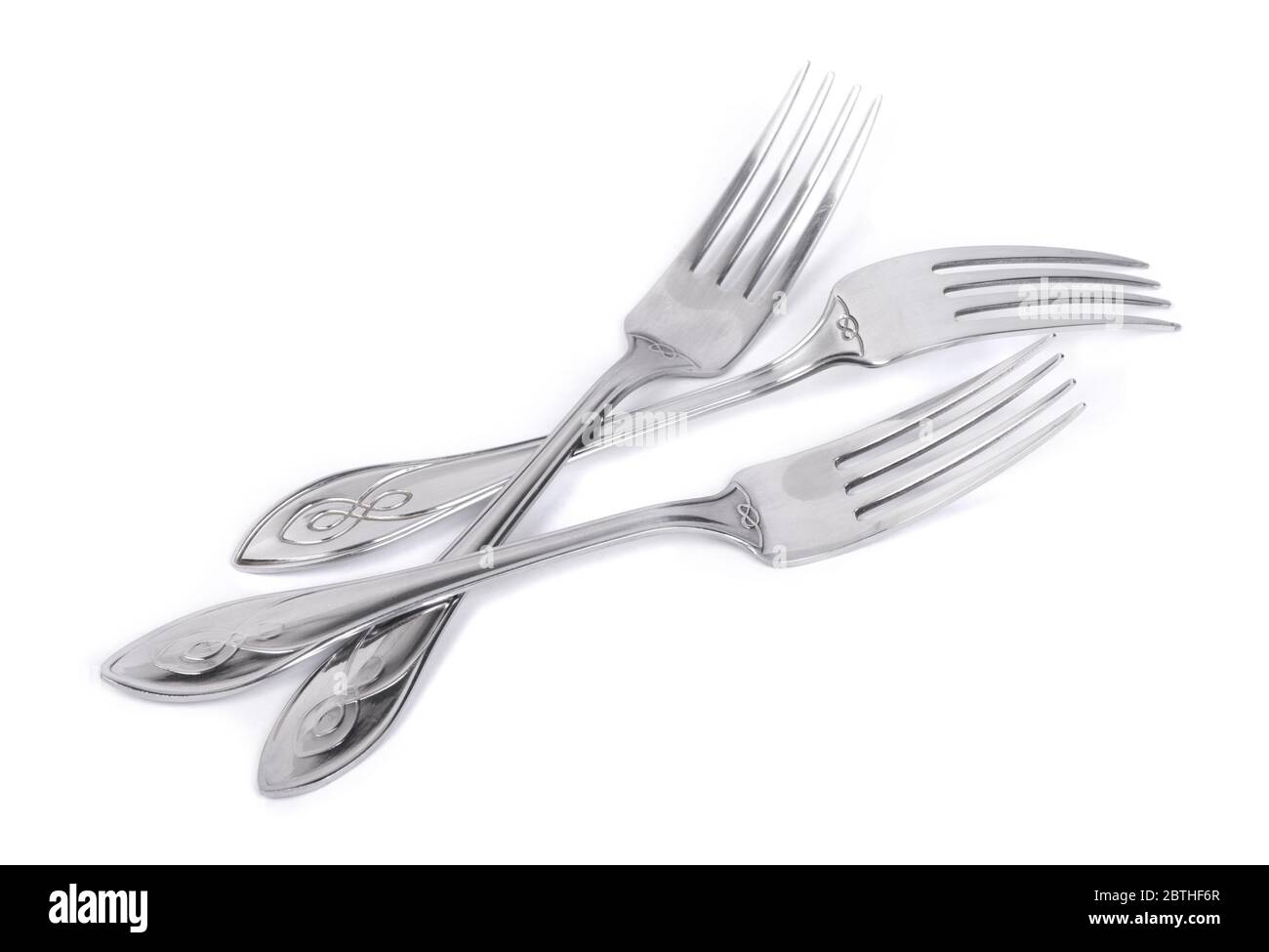 Three stainless steel forks isolated on white background Stock Photo ...