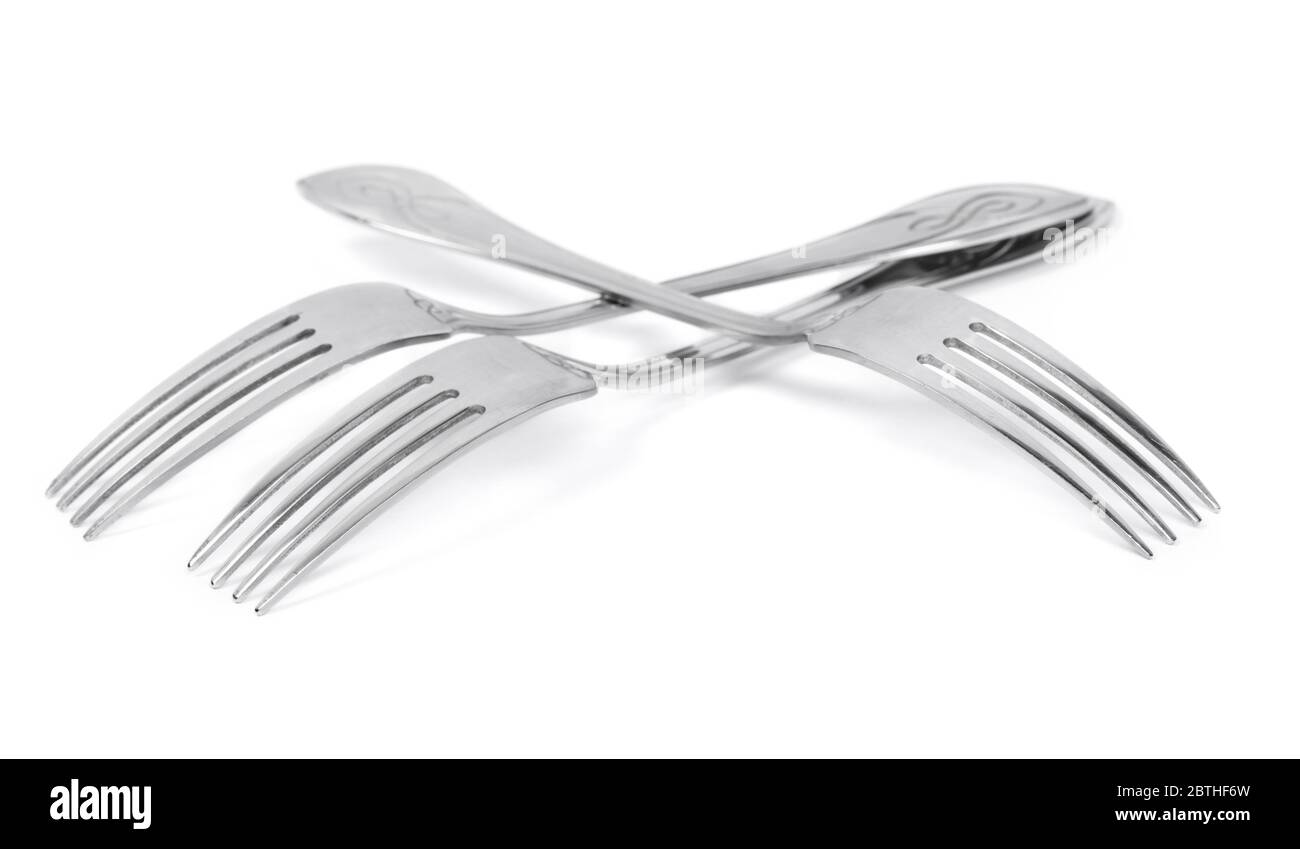 Three stainless steel forks isolated over white background Stock Photo ...