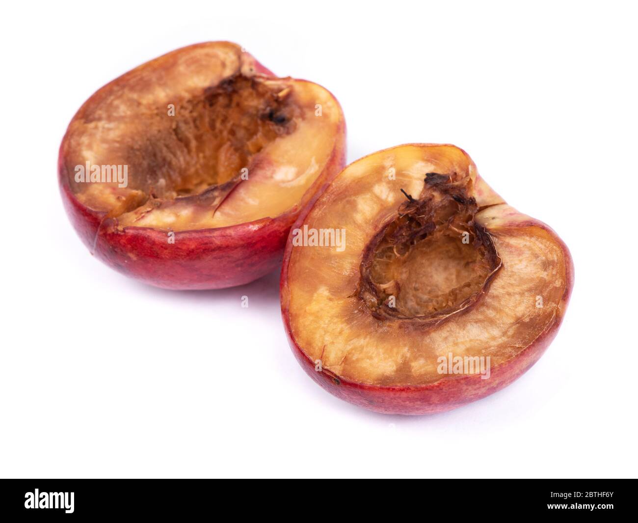 Rotten peach core hi-res stock photography and images - Alamy