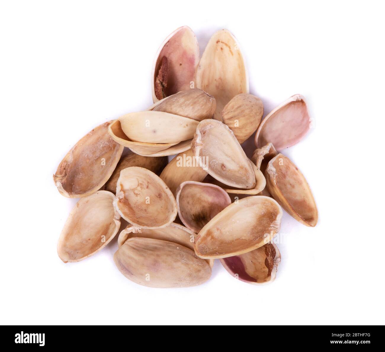 Heap of empty pistachios shells isolated on white background Stock ...