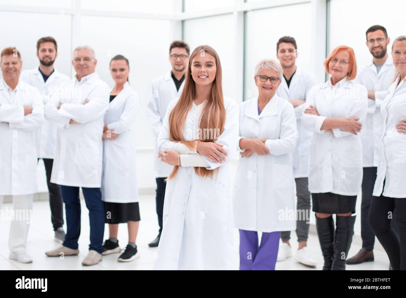 young researcher standing ahead of her senior colleagues Stock Photo ...