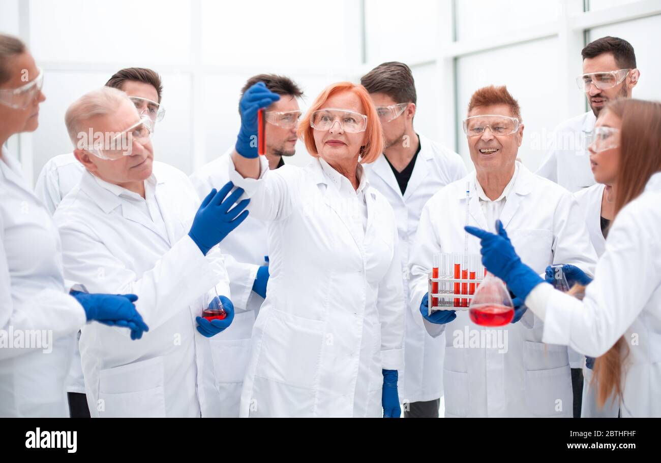 research supervisor discussing the results of the study with colleagues ...