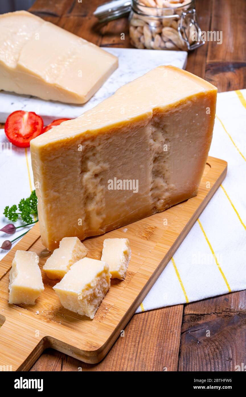Big wedges of parmigiano-reggiano parmesan hard Italian cheese made ...