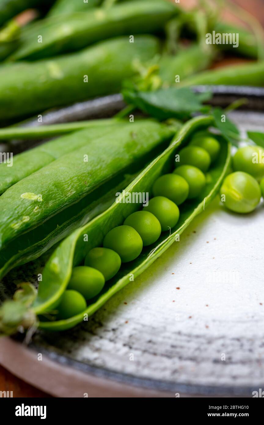 New harvest of fresh ripe green peas legumes Stock Photo - Alamy