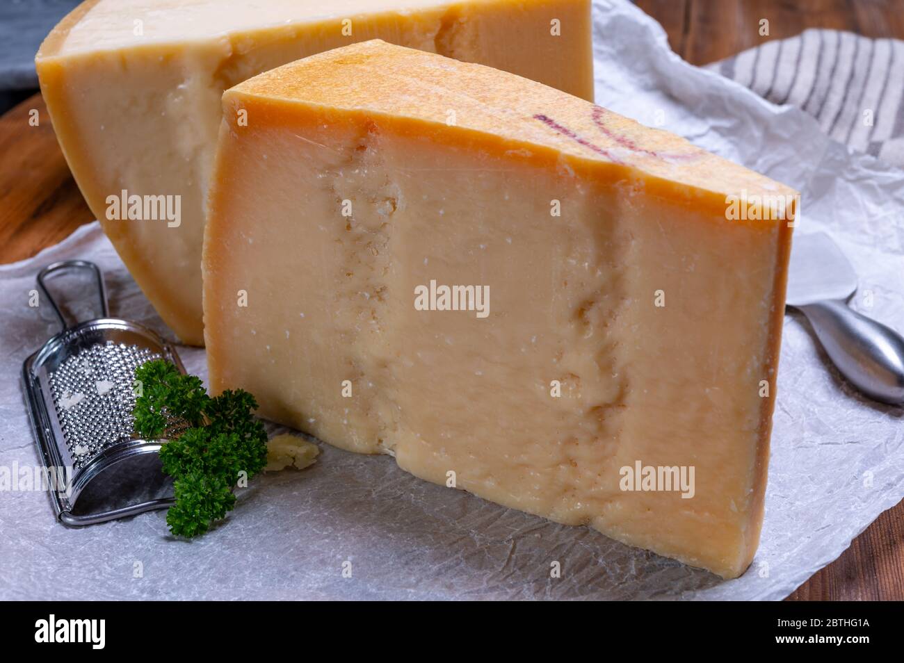 Big wedges of parmigiano-reggiano parmesan hard Italian cheese made ...