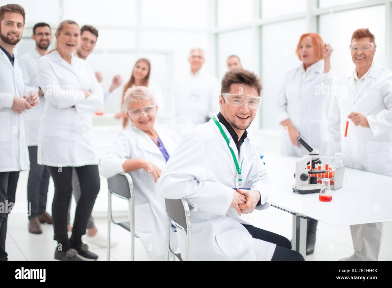 group of researchers at the workplace in the laboratory Stock Photo - Alamy