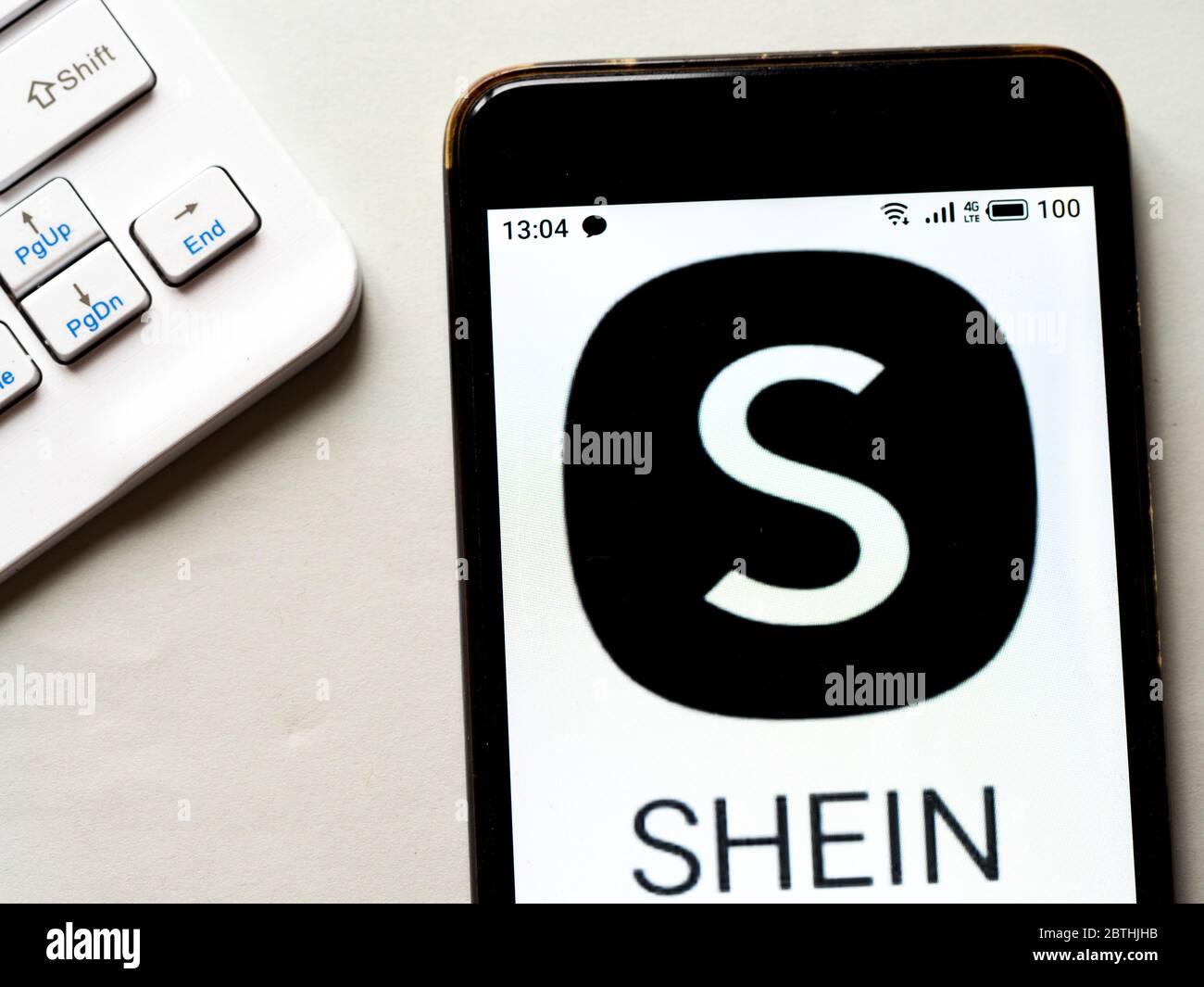 In this photo illustration e-commerce Shein logo is seen displayed on a ...