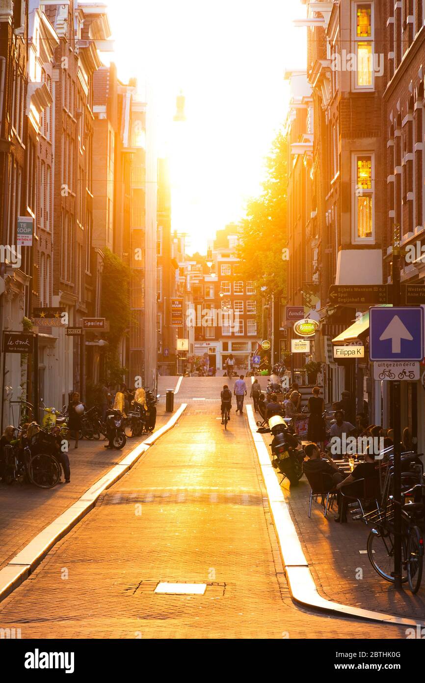 Cityscape urban street view at evening in Amsterdam, the Netherlands ...