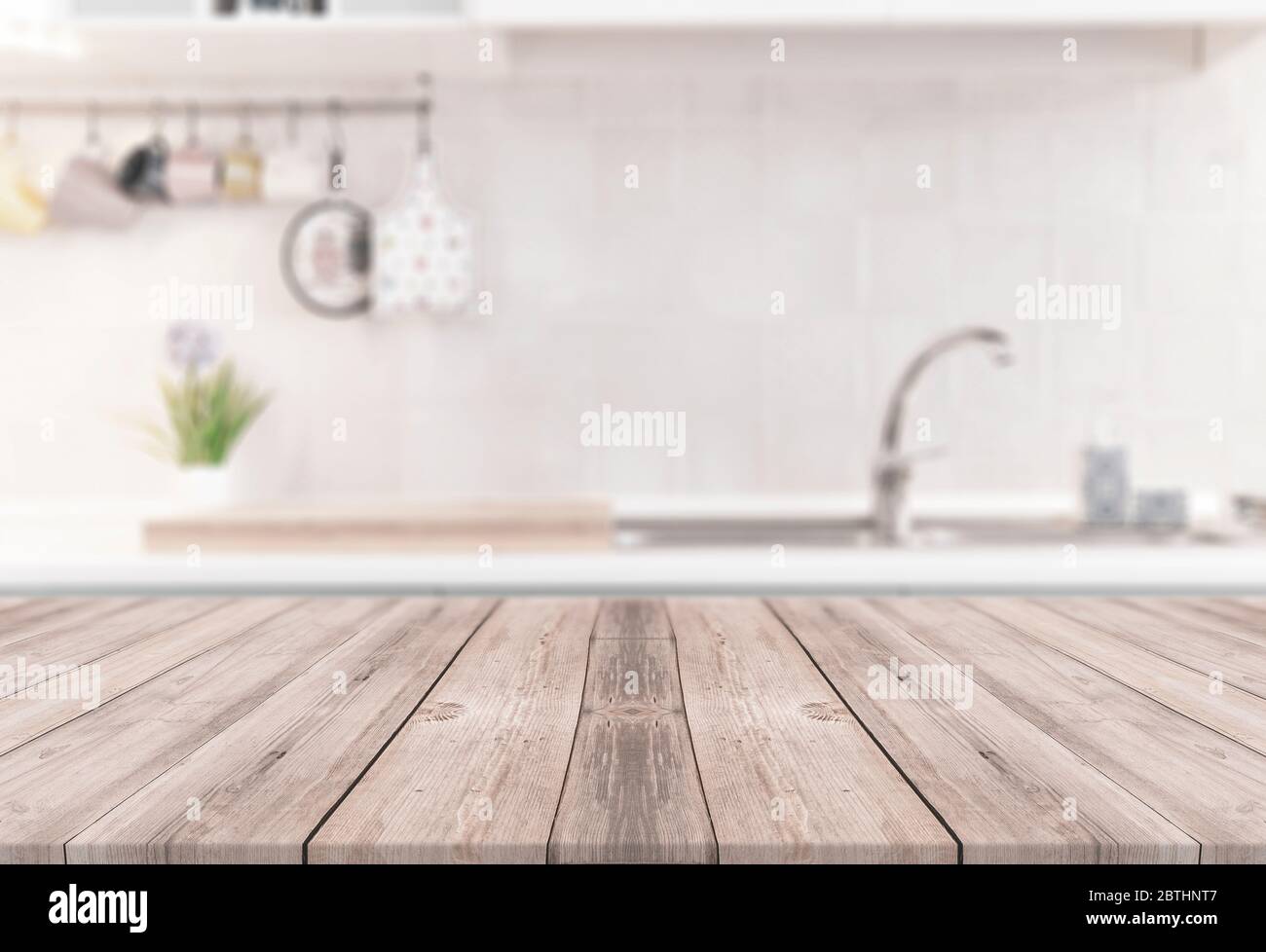 Wooden table with kitchen on the blurred background - modern bright ...
