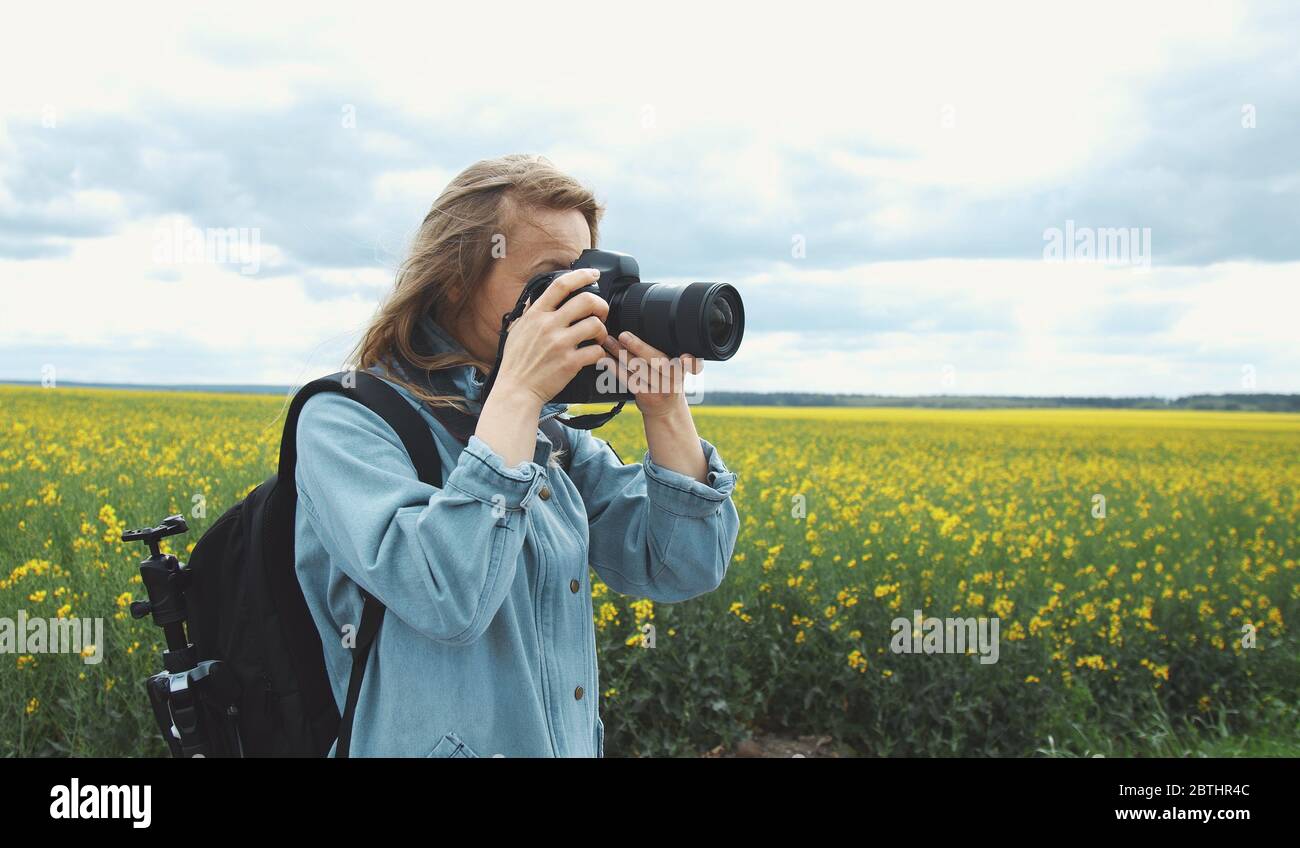 Woman photographer using dslr camera hi-res stock photography and ...