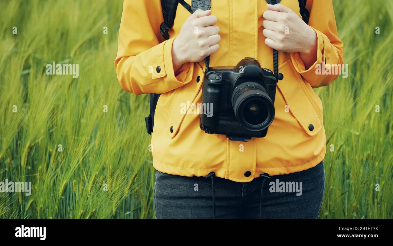 Person holding camera hi-res stock photography and images - Alamy