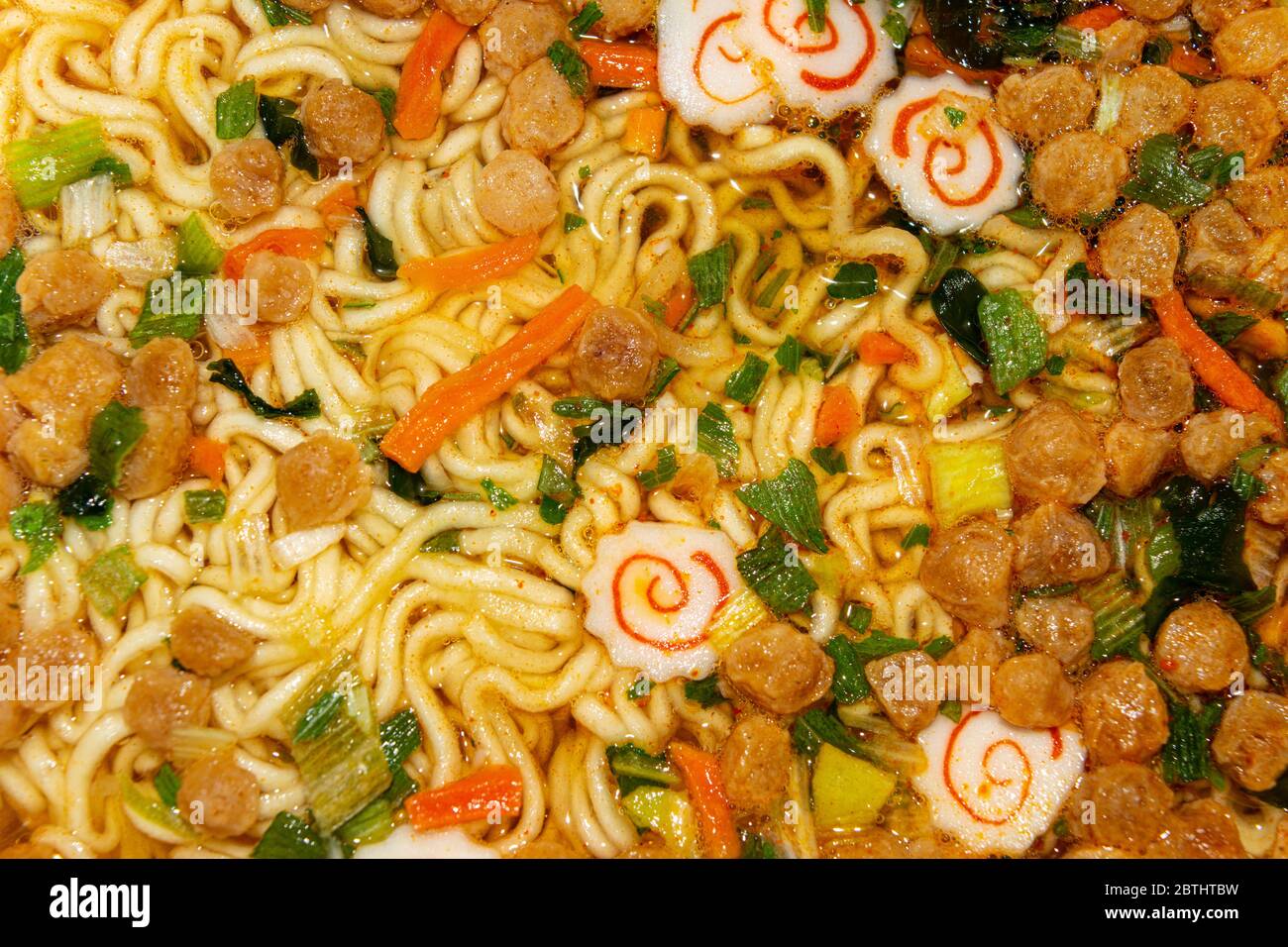 Instant noodles with spices, dried vegetables and freeze-dried meat ...