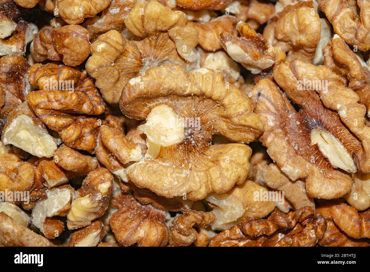 Peeled walnuts close-up. Surface texture. Healthy diet Stock Photo - Alamy