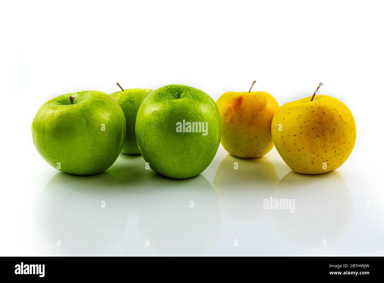 Yellow and green apples isolated on white background Stock Photo - Alamy