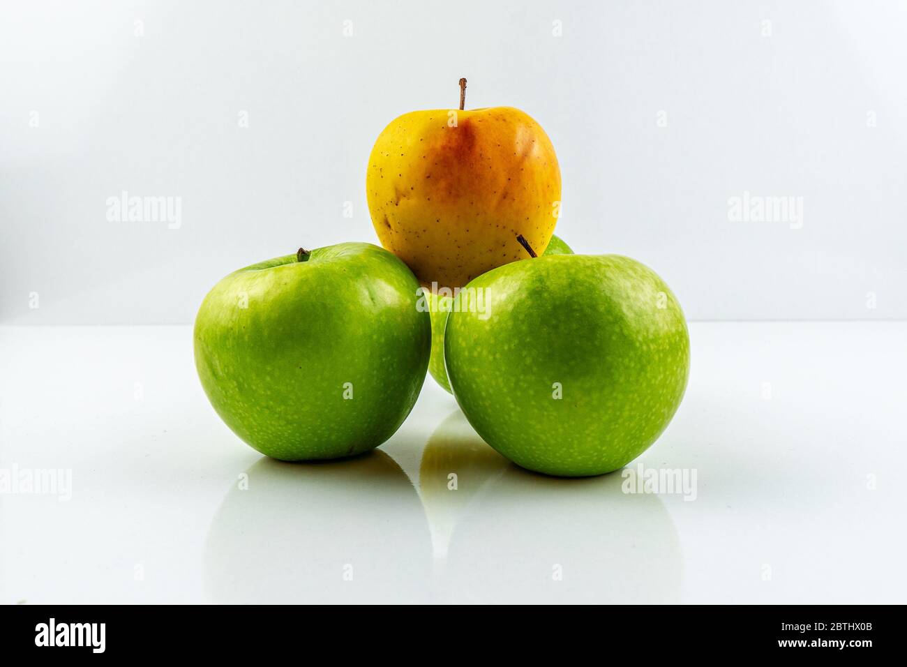 Yellow and green apples isolated on white background Stock Photo - Alamy