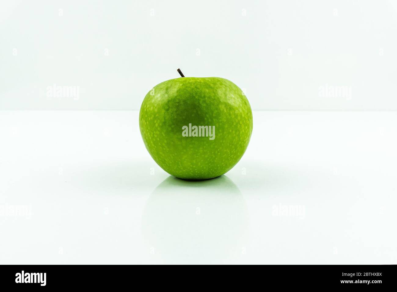 Green apple isolated on white background Stock Photo - Alamy