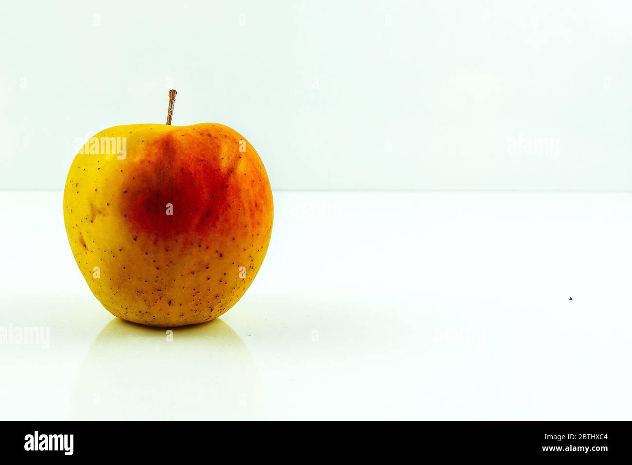 Yellow -red apple isolated on white background Stock Photo - Alamy