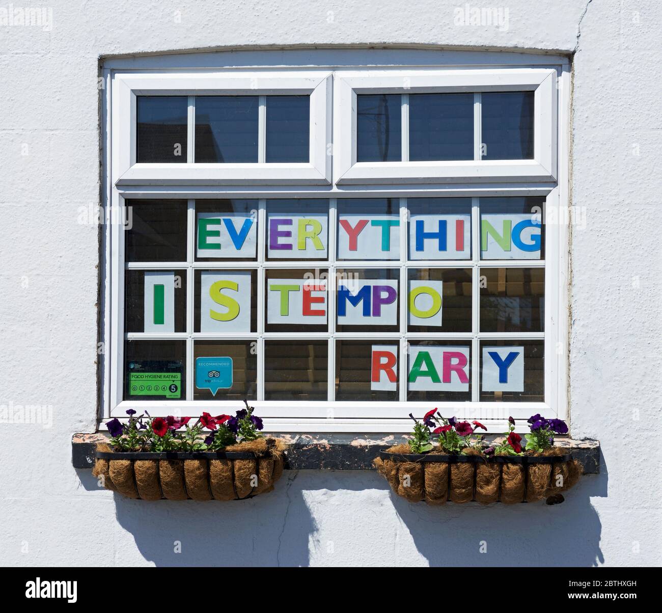 Sign in window: everything is temporary, England UK Stock Photo - Alamy