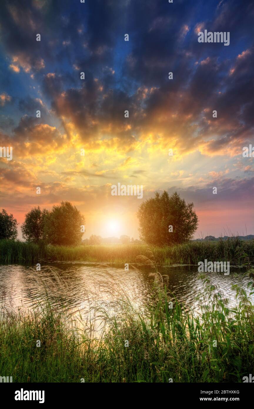 beautiful river sunset over the river Angstel in Baambrugge, the ...
