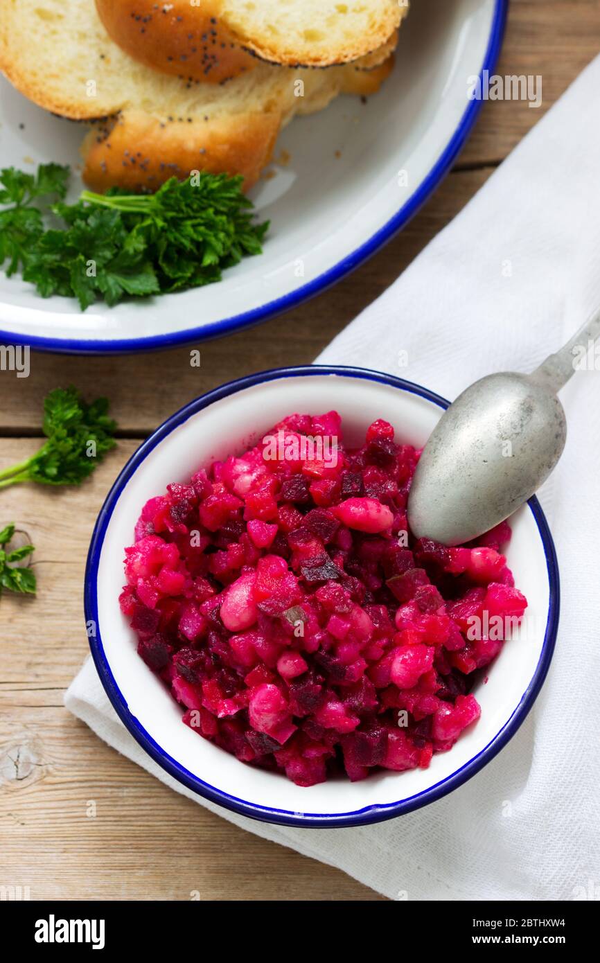 Traditional Russian lean vegetable salad vinaigrette in an iron bowl ...