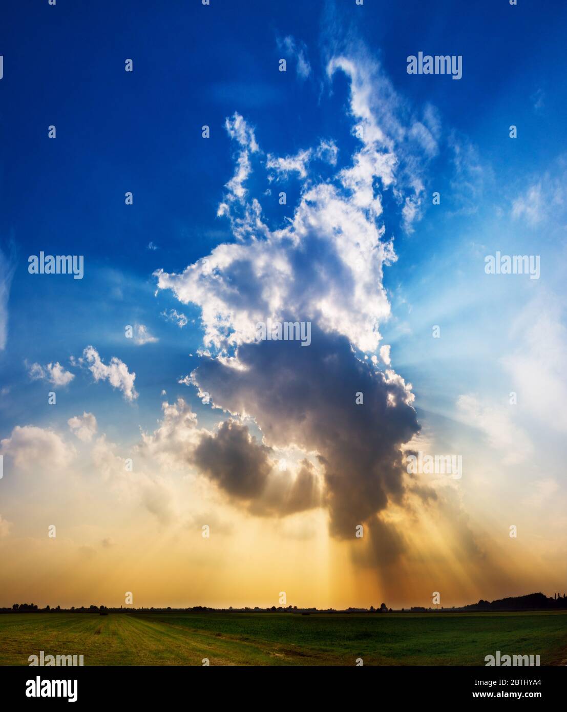 Divine light shines through the clouds with crepuscular rays Stock ...