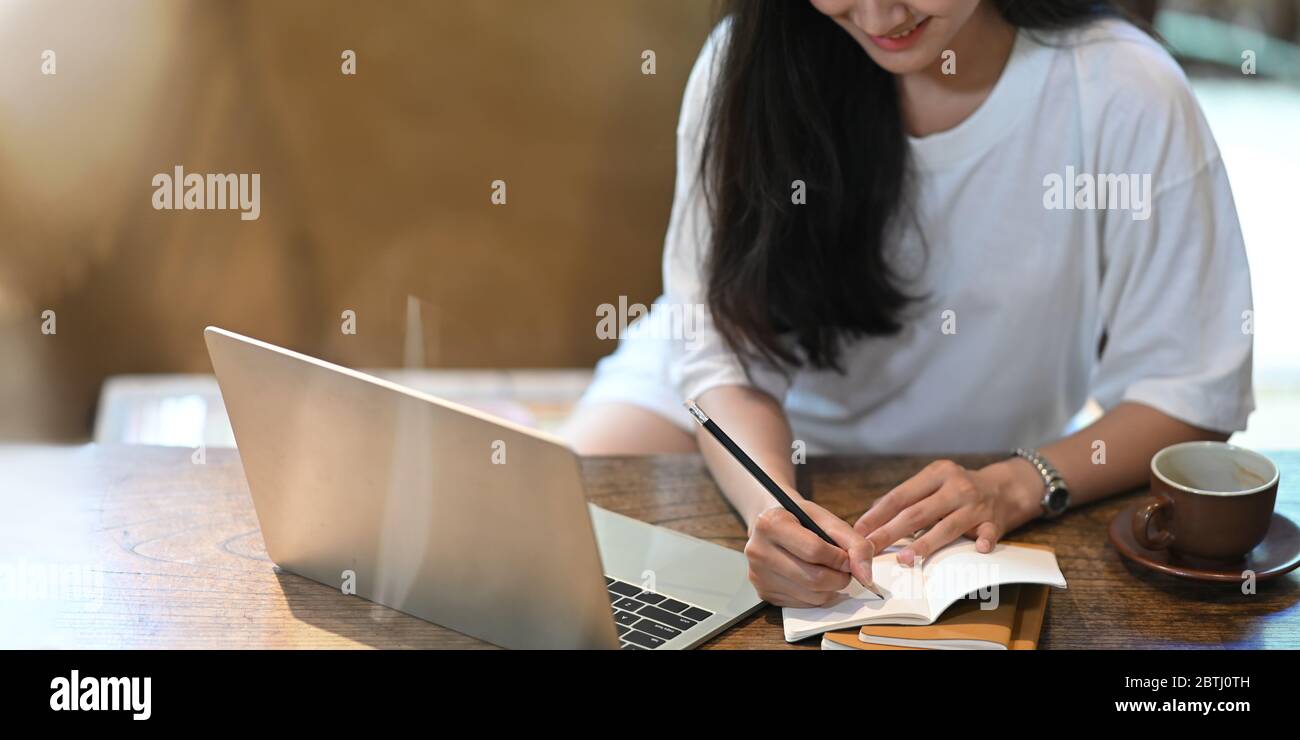 Student doing homework taking notes hi-res stock photography and images ...