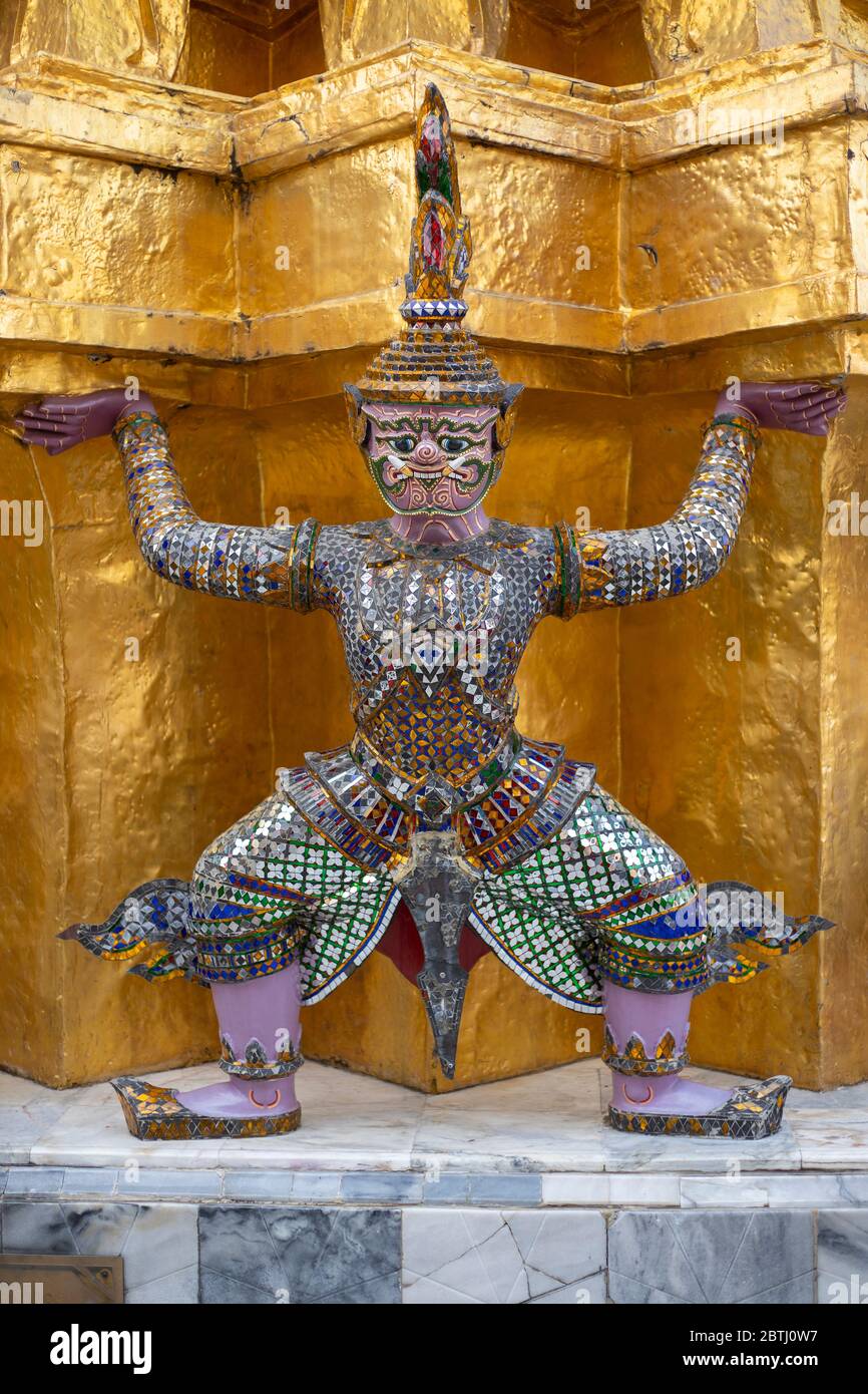 Gold demons guard facades and entrances at Grand Palace, Bangkok ...