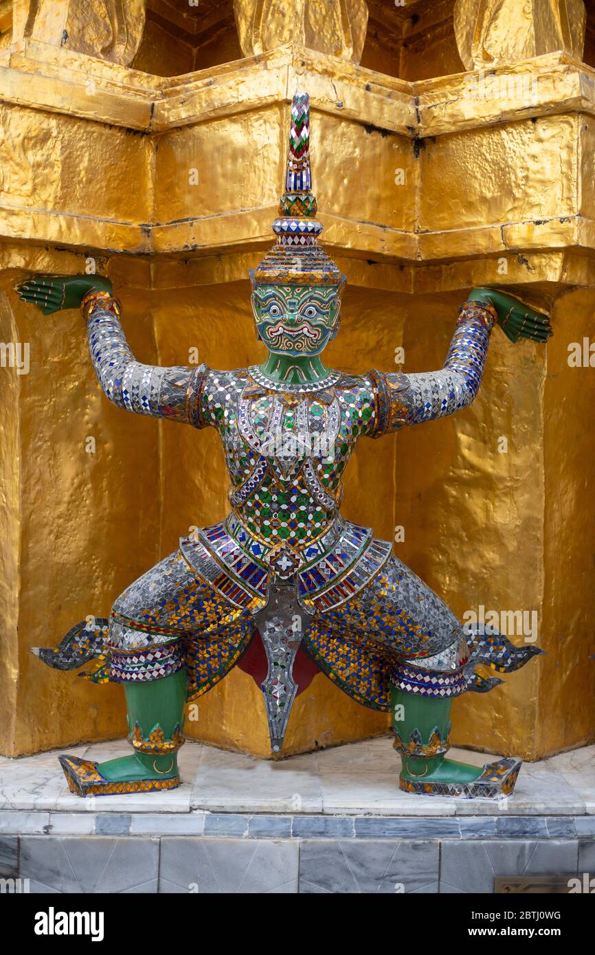 Gold demons guard facades and entrances at Grand Palace, Bangkok ...