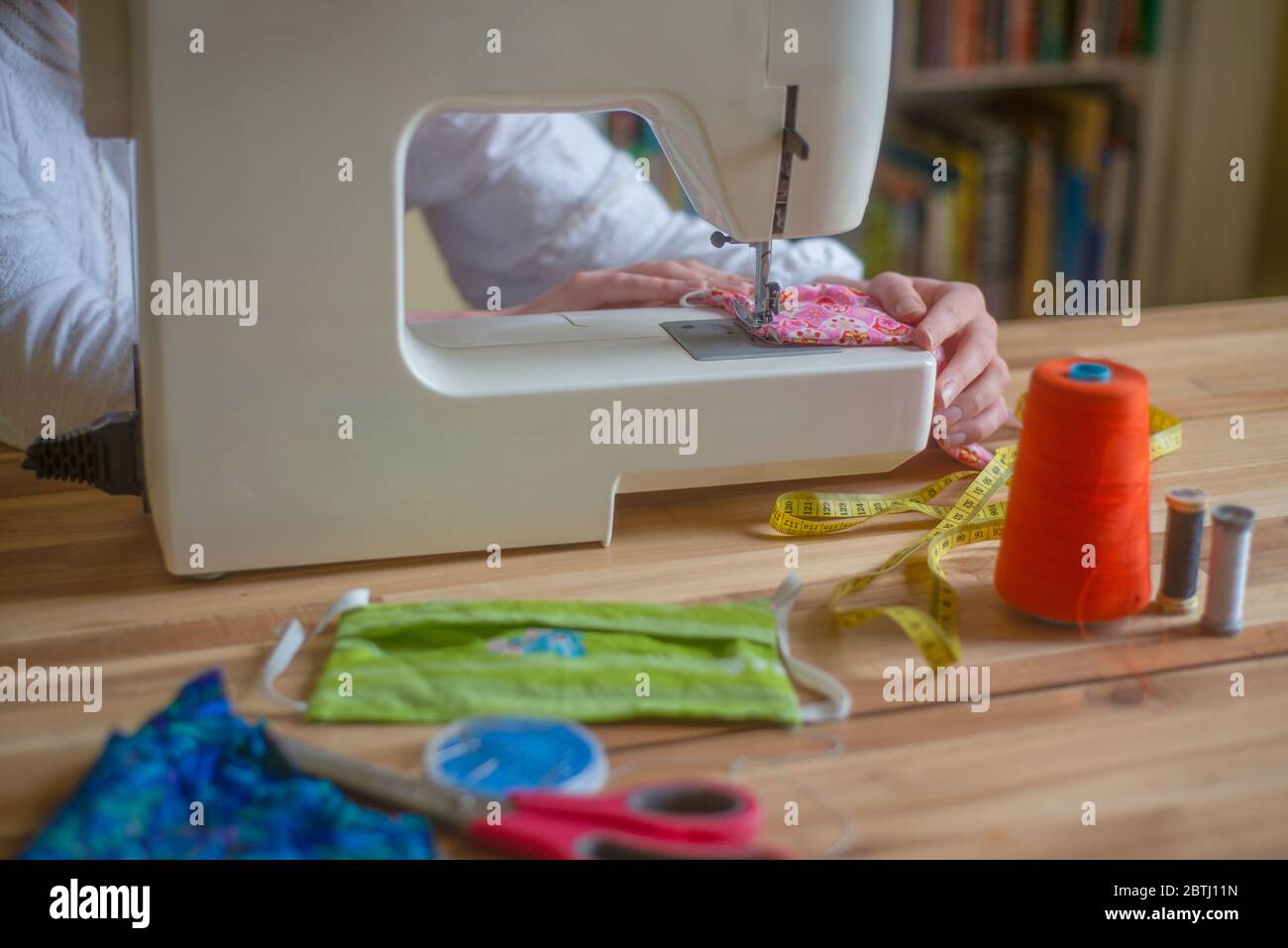 Womans hand sewing on machine hi-res stock photography and images - Alamy