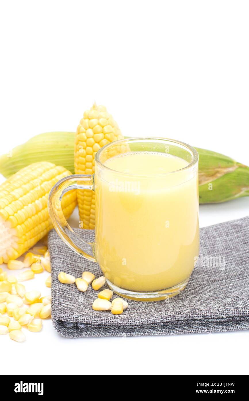Fresh sweet corn juice (corn milk) and corn isolated on white ...
