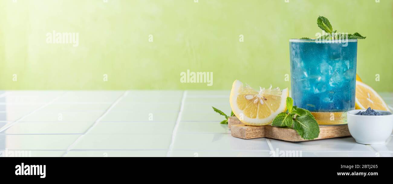 Blue matcha lemonade on white background Stock Photo - Alamy