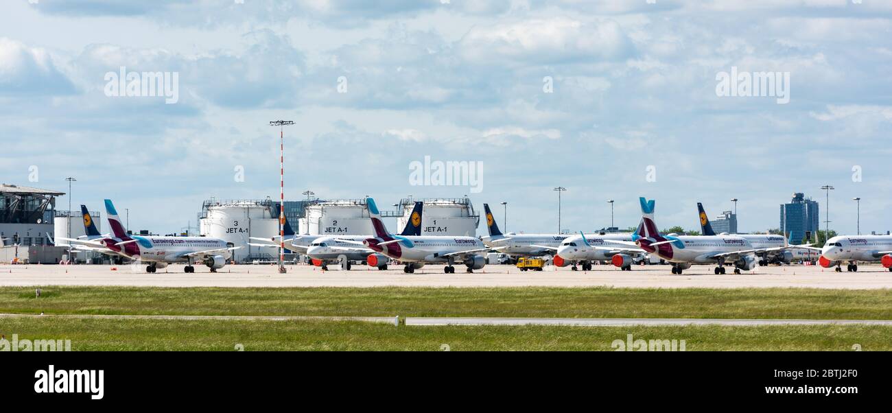 Lufthansa and Eurowings aircraft are parked at the runway of Stuttgart ...