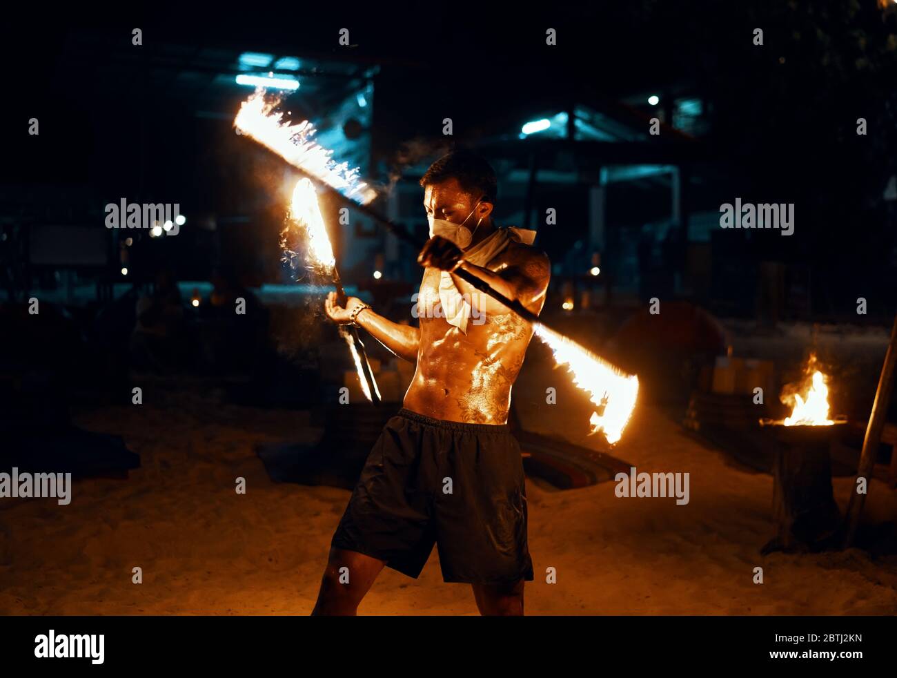 KOH LIPE, THAILAND - JANUARY 23, 2020: Fire show. Man juggling with ...