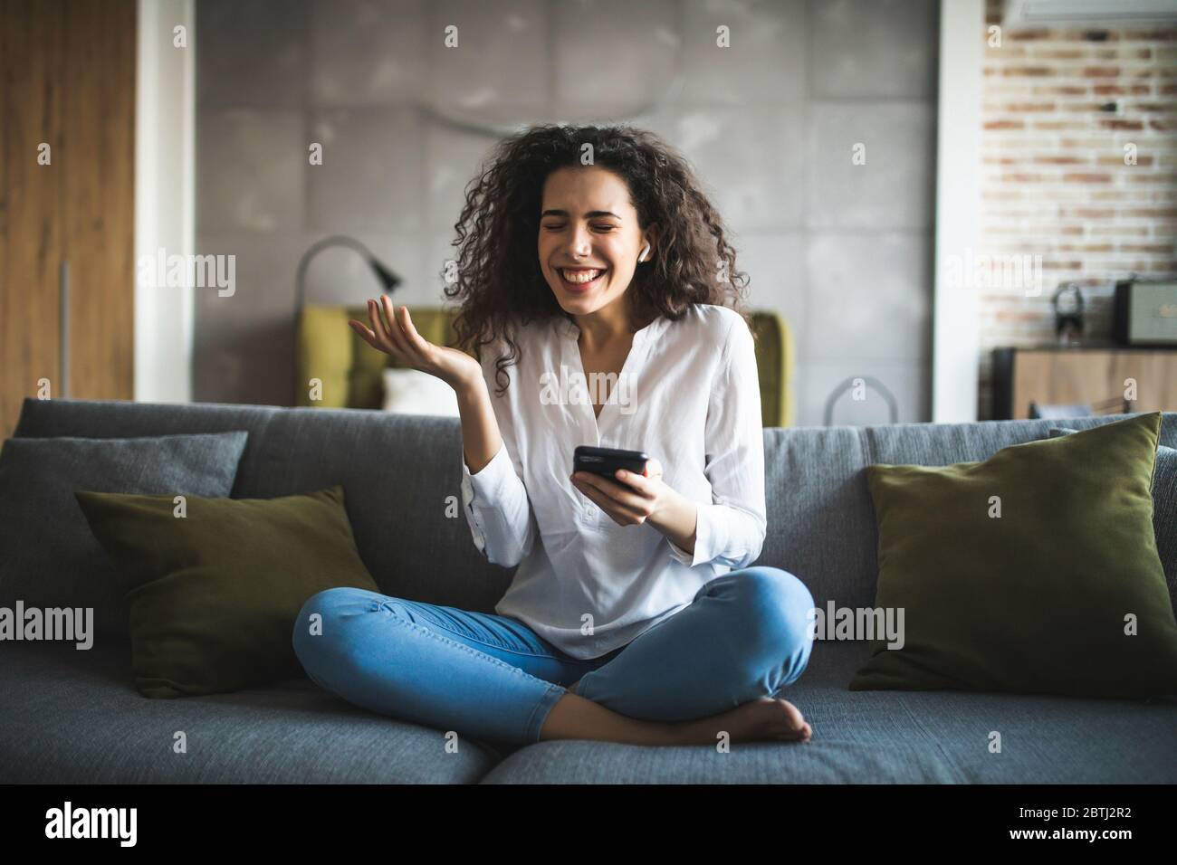 Woman undecided looking at camera hi-res stock photography and images ...
