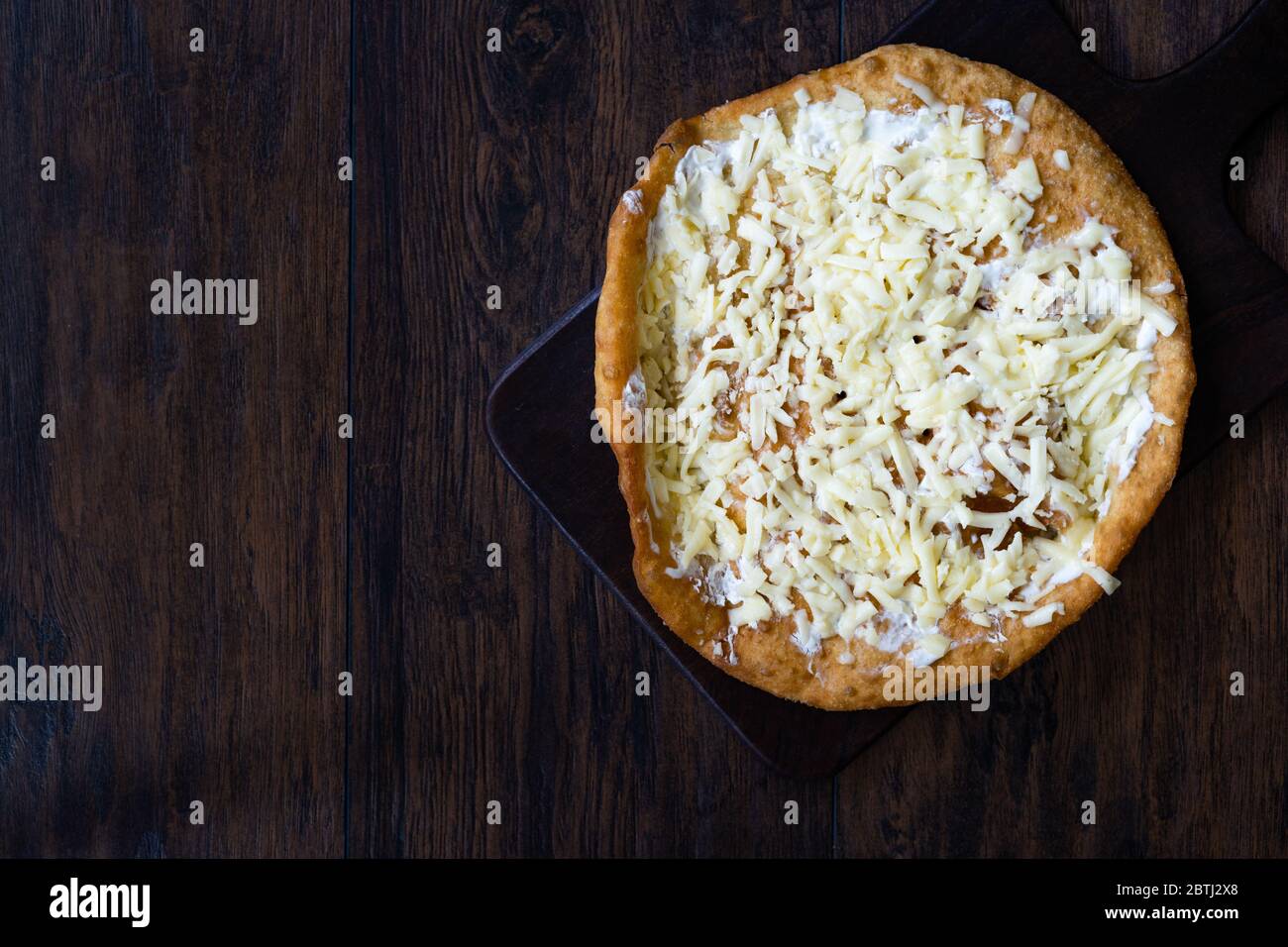 Traditional Langos / Langosh are originally Hungarian fried pancakes ...