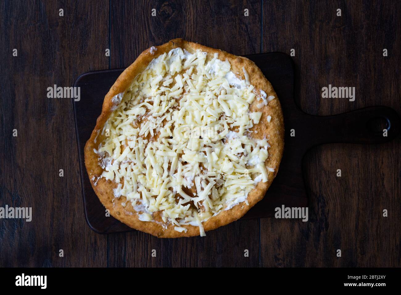 Traditional Langos / Langosh are originally Hungarian fried pancakes ...