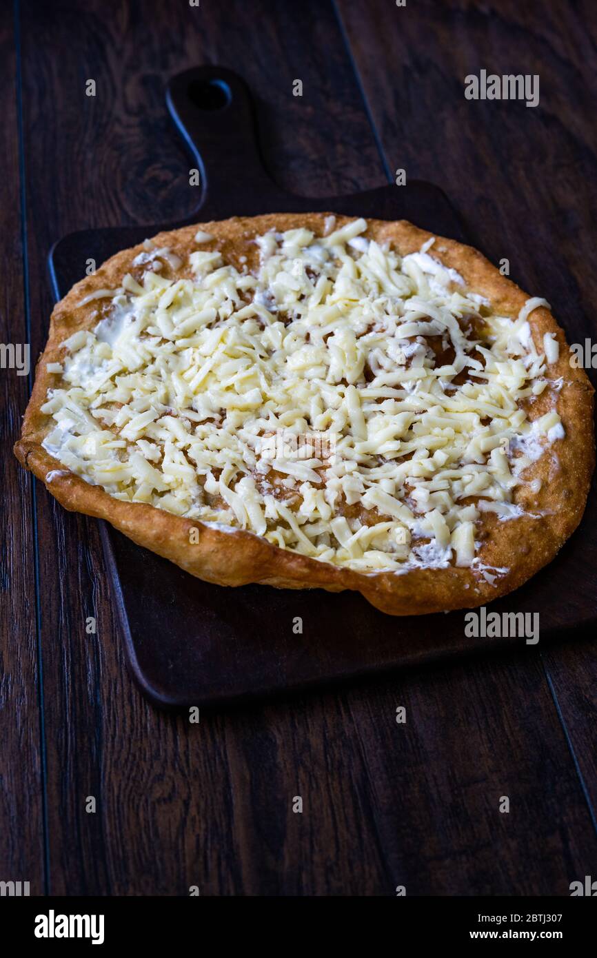 Traditional Langos / Langosh are originally Hungarian fried pancakes ...