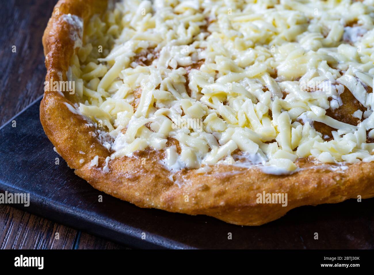 Traditional Langos / Langosh are originally Hungarian fried pancakes ...