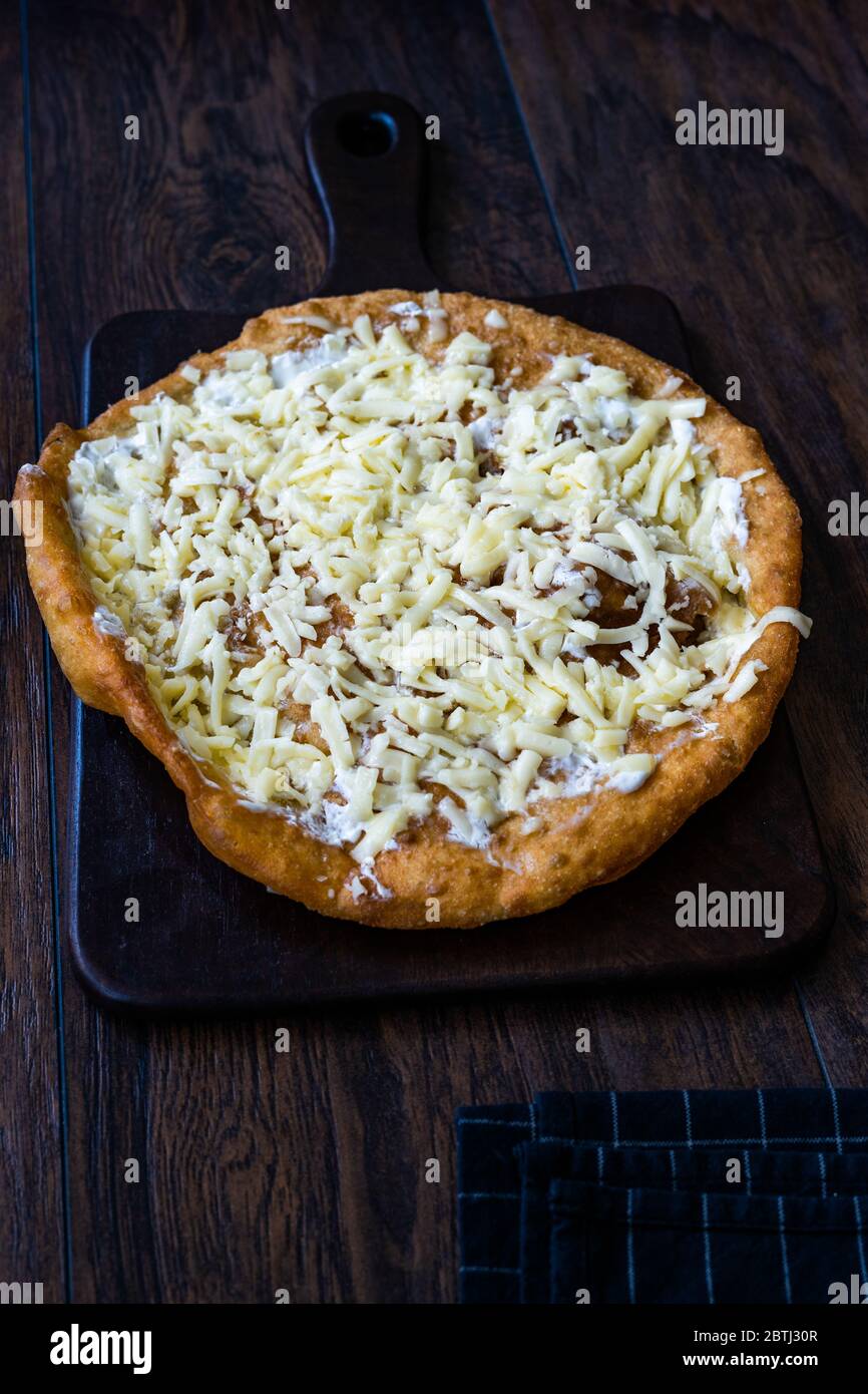 Traditional Langos / Langosh are originally Hungarian fried pancakes ...