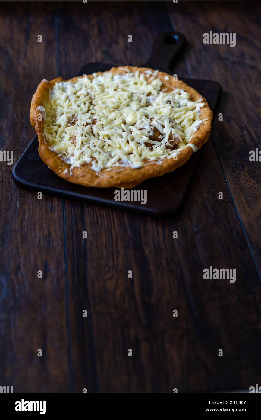 Traditional Langos / Langosh are originally Hungarian fried pancakes ...