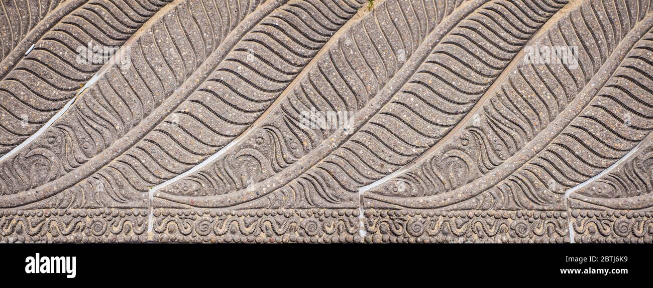 panorama feather like carved pattern in stone concrete Stock Photo - Alamy