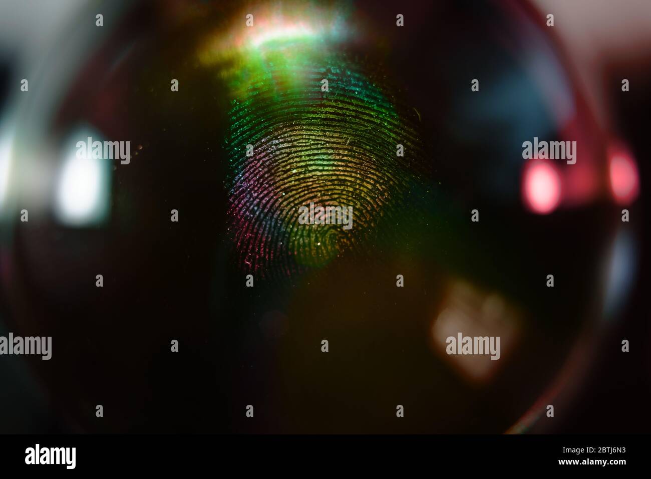 Close up beautiful abstract multi colored fingerprint on background ...