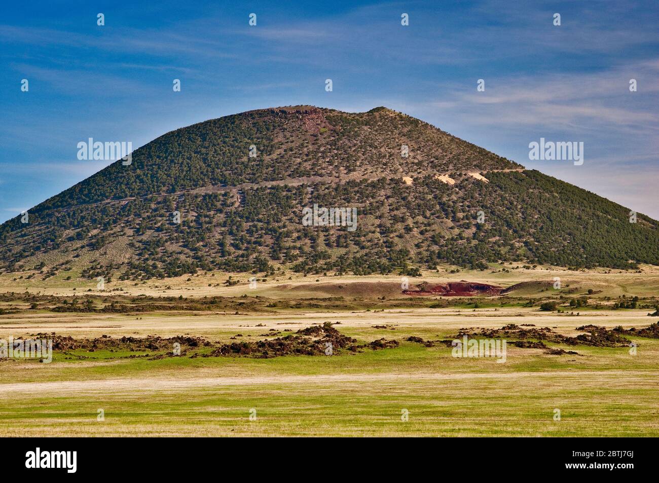 Distant view of crater, volcanic rocks, Capulin Volcano National ...