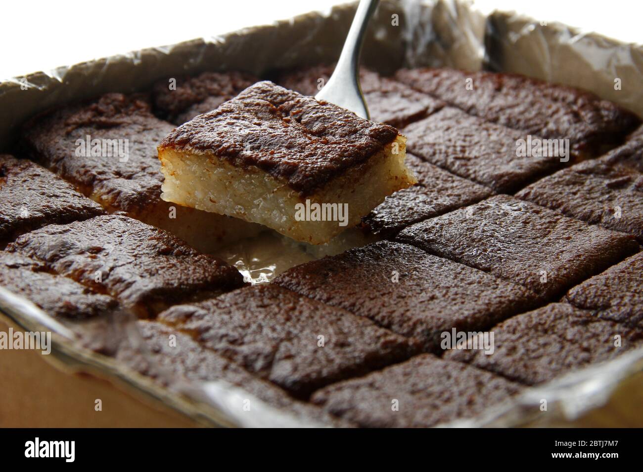 Photo of Filipino snack food called Bibingka Malagkit or rice cake made ...