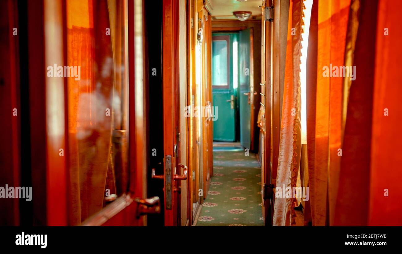 Interior of long hallway in old retro wooden train car Stock Photo - Alamy