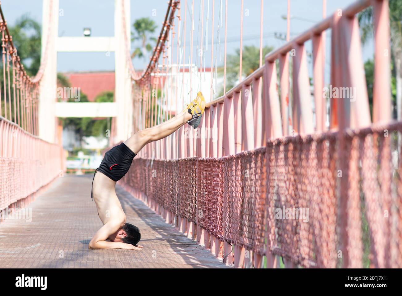 Bridge pose sporty men doing warming up exercise for spine, Handstand ...