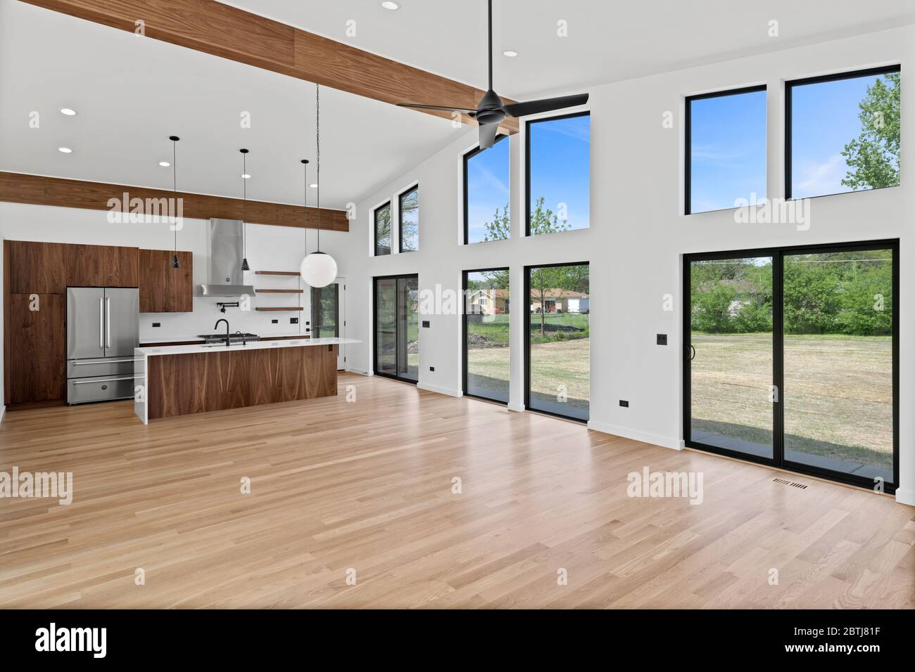 Interior of suburban new construction designed in a mid century revival ...